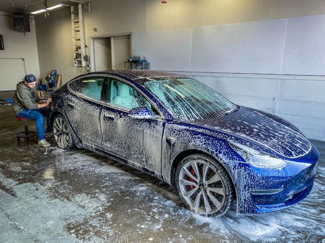 Tesla model 3 car wash store